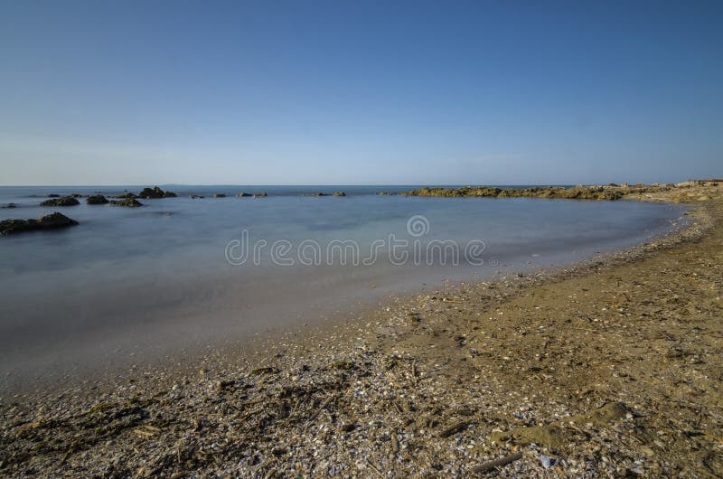 Sea Landscape with Rocks Emerging from the Sea Stock Photo - Image of ...