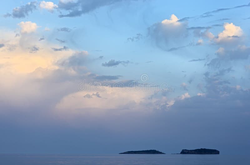 Sea Landscape with Two Islands and Beautiful Sky Stock Photo - Image of ...