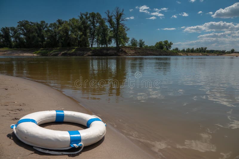 Sea Life Saver Float on the River Surface Stock Photo - Image of float ...