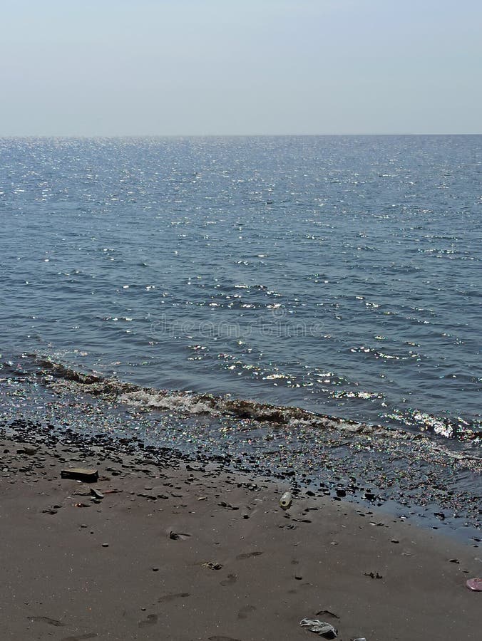 Sea, light and sky stock image. Image of rock, mudflat - 181619151