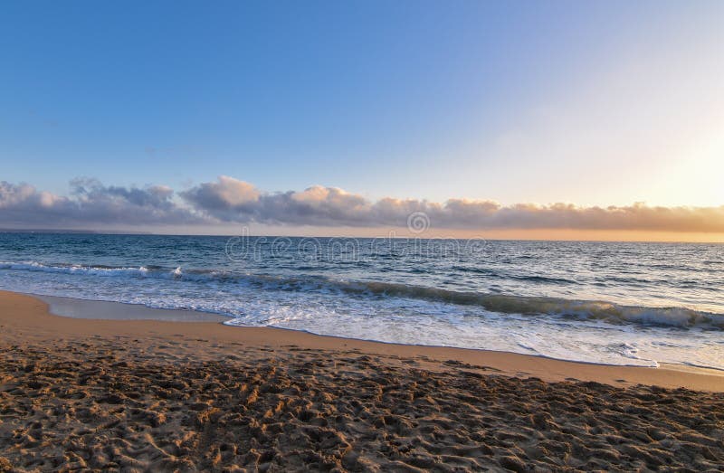 When sea meets sand stock image. Image of horizon, sunlight - 265619407