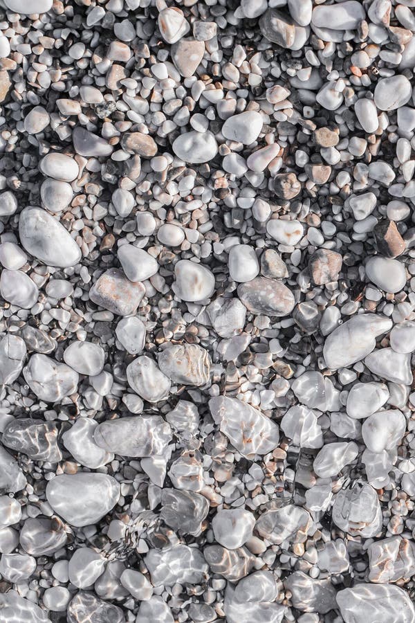 Sea Pebbles on the Beach Under a Layer of Transparent Water Stock Image ...