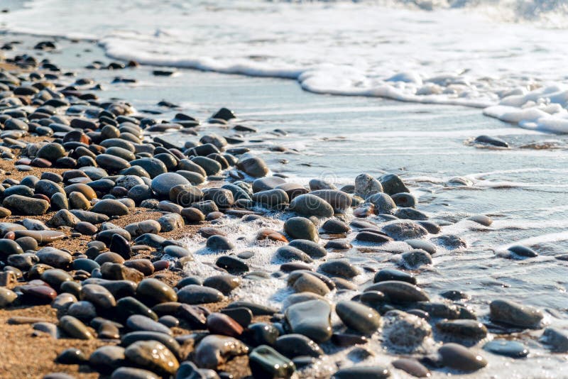 Sea Pebbles Washed by the Waves at Sunrise Stock Image - Image of ...