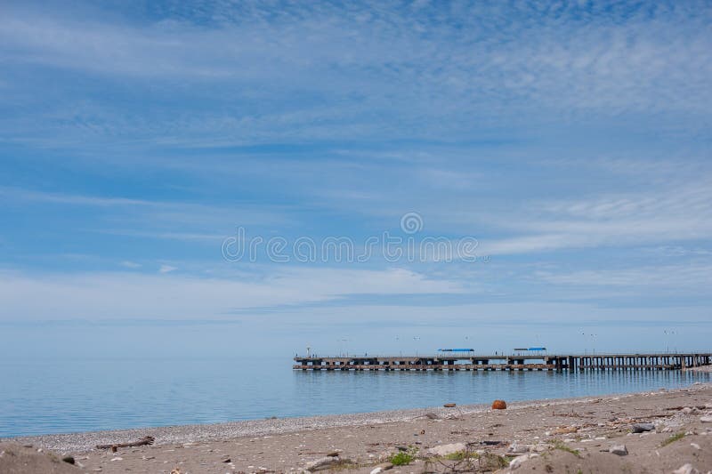 Sea Pier, Blue Sky with Light Clouds Stock Photo - Image of season ...