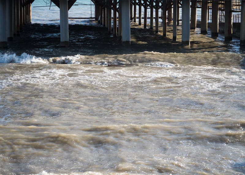 Sea Pier with Columns on the Beach Stock Photo - Image of columns ...