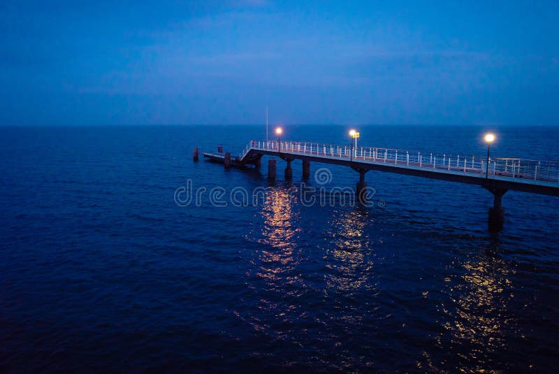 Sea pier at night stock photo. Image of florida, stars - 74321874