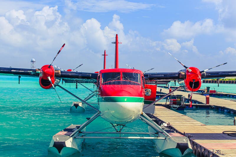 Sea Plane Docked at the Arrival Pier. Maldives Stock Photo - Image of ...