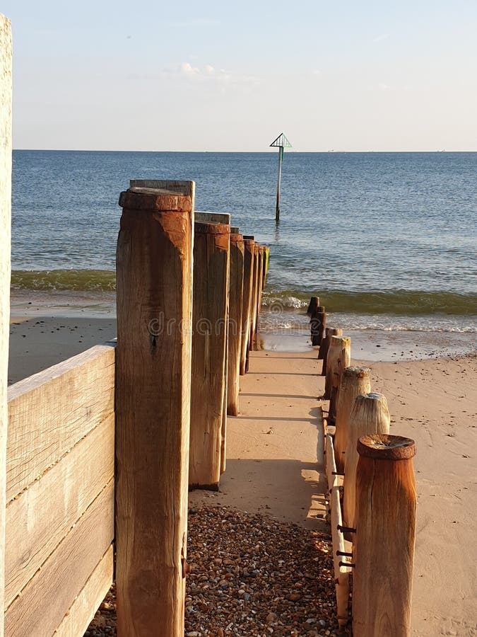 Sea Posts stock photo. Image of beach, wooden, sand - 147844800