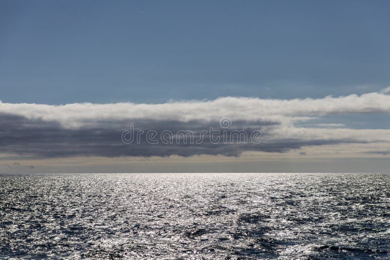 Sea reflections and clouds stock image. Image of seascape - 260663857