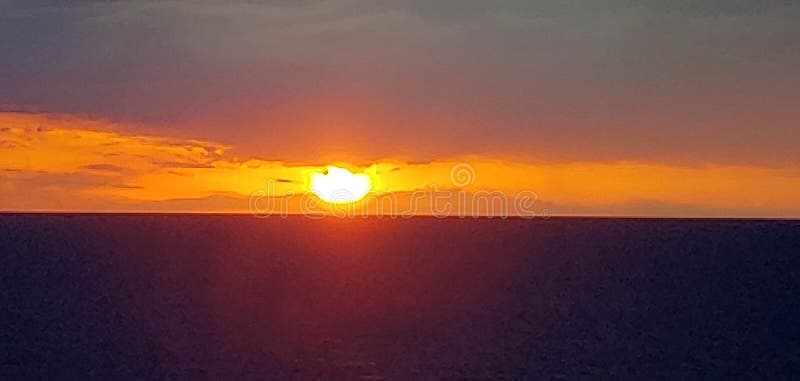 Sea with a rising sun stock image. Image of rising, wakeup - 170257539