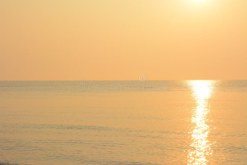 Sea with rising sun stock photo. Image of rise, water - 66569984