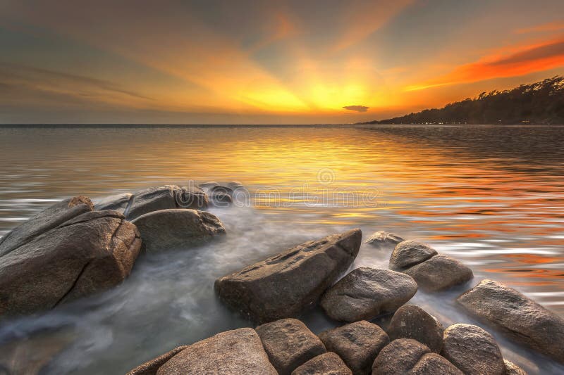 Sunset Wave Rock on the Beach Stock Image - Image of autumn, light ...