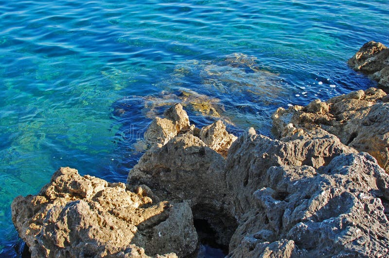 Sea and rocks stock photo. Image of vacation, background - 12867294