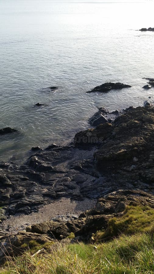 Sea and Rocks at Dublin Bay Stock Photo - Image of rocks, ireland: 49348918