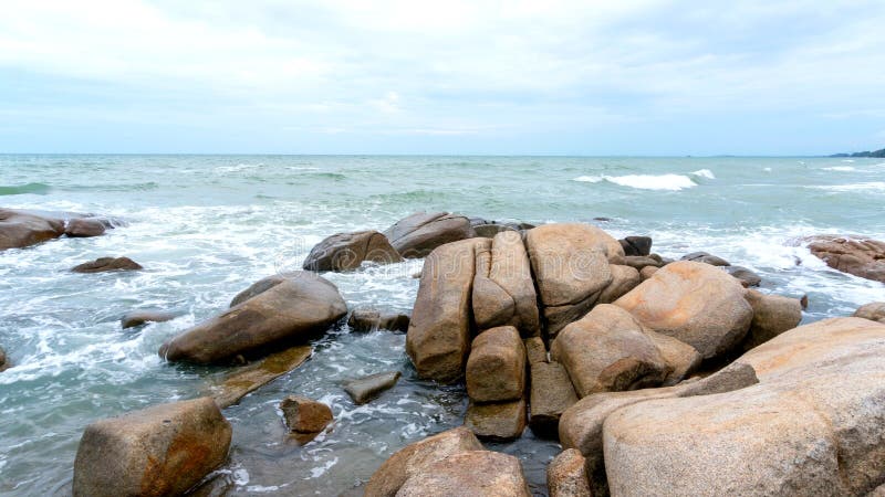 Sea and rocks stock photo. Image of dusk, evening, lake - 124616500