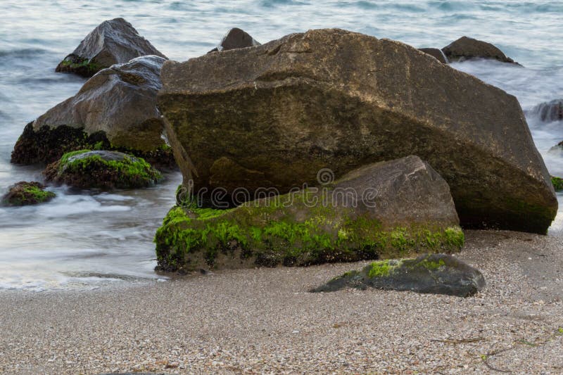 Sea with rocks stock photo. Image of peaceful, beach - 56893480