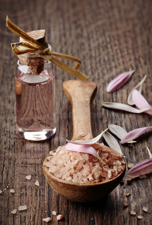 Sea salt and aroma oil stock photo. Image of herbs, bottle - 36740758