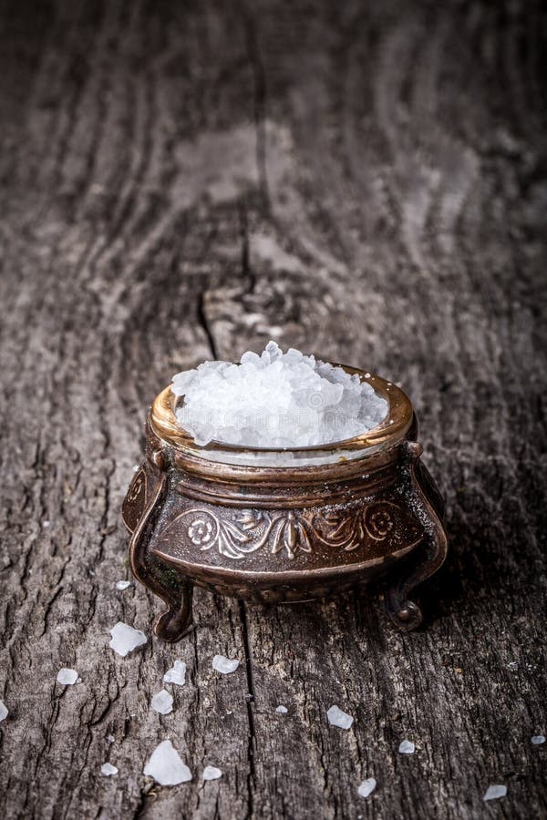 Sea Salt in an Old Utensils on Wooden Table.tinted.vertical Stock Image ...