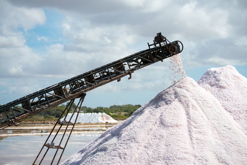 Sea salt production. stock photo. Image of machinery - 45552438