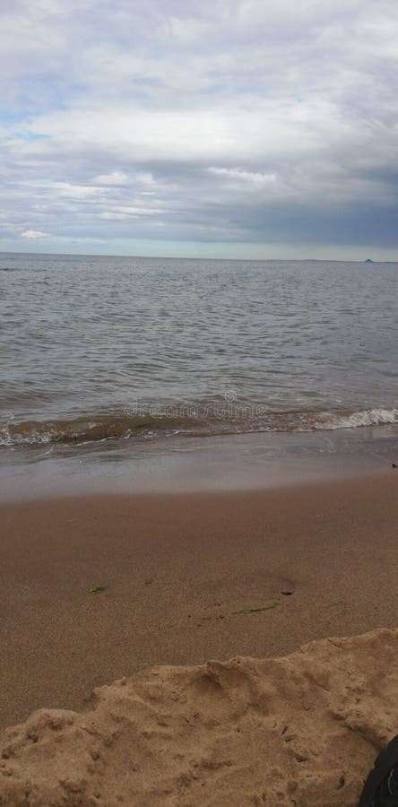 Sea scape, simple beach stock photo. Image of wind, mudflat - 223700736