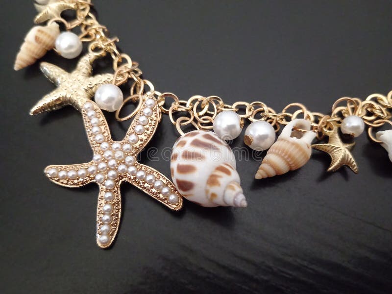 Sea shell bijou bracelet stock image. Image of beads - 296525665