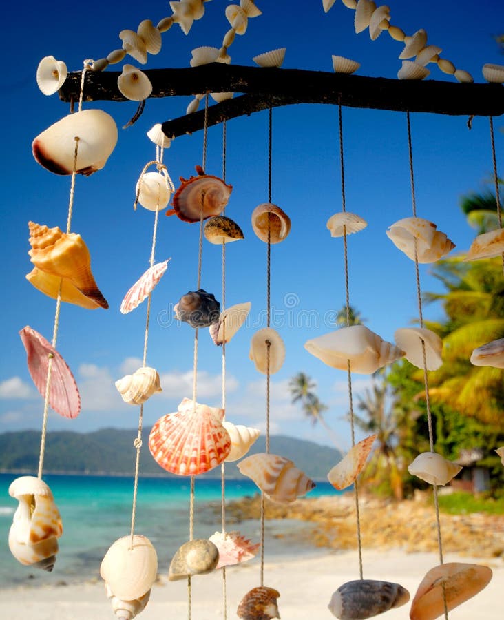 Sea Shell Chime Overlooking a Tropical Lagoon. Stock Image - Image of ...