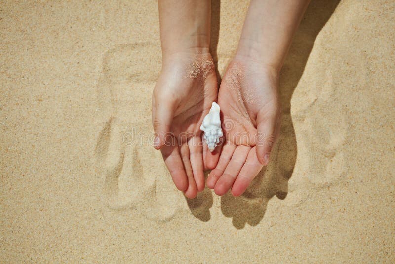 Sea Shell Inside Kids Hand As a Symbol of Protection and Safety Stock ...