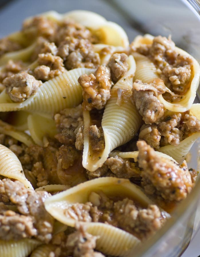 Sea shells pasta with meat stock image. Image of square - 6457119