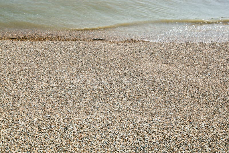 Sea and shingle beach stock photo. Image of stones, great - 85297774