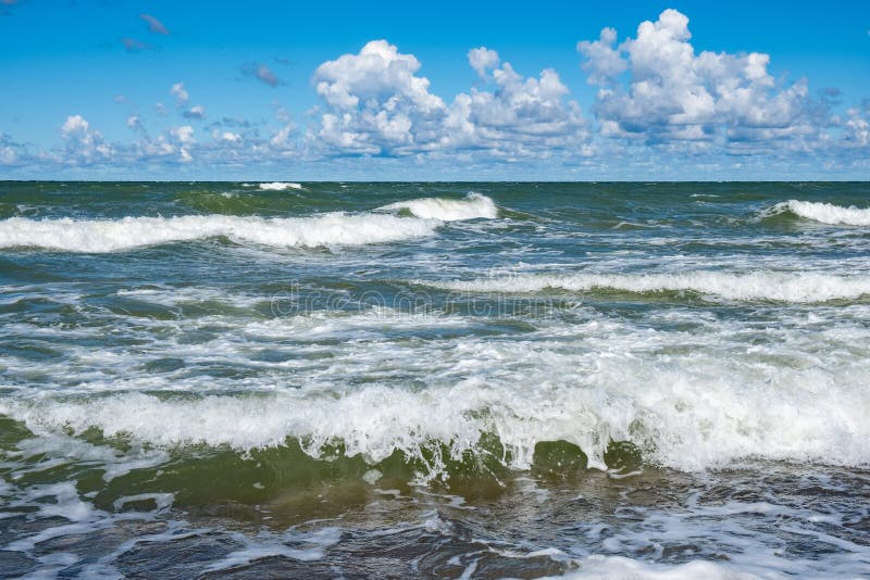 Sea shore scene and waves stock photo. Image of foam - 240523416