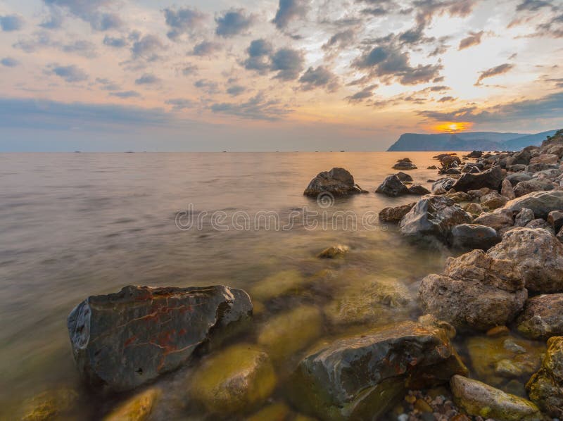 Sea, shore and stones stock image. Image of scene, colorful - 29719213