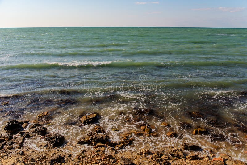 Sea shore in sunny day stock photo. Image of surf, landscapes - 68935348