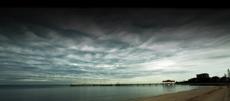 Sea side jetty stock photo. Image of cloudy, black, clouds - 27071816