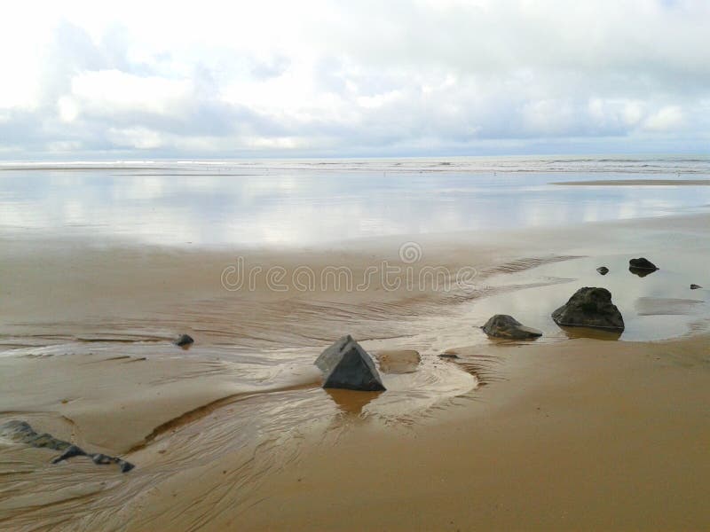 Sea and sky mirror effect stock photo. Image of smooth - 164053478