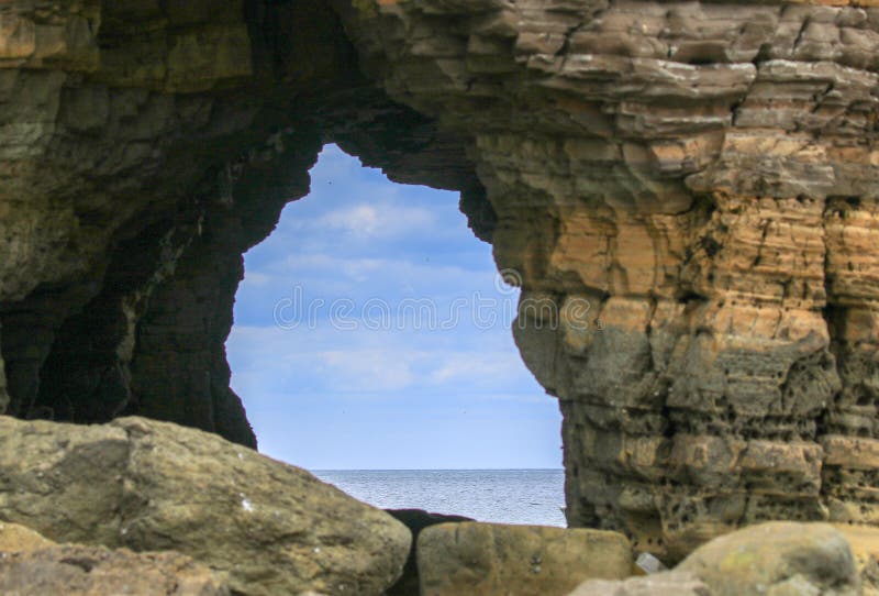 Stack of Beach Stones on Sand Stock Photo - Image of outdoors ...
