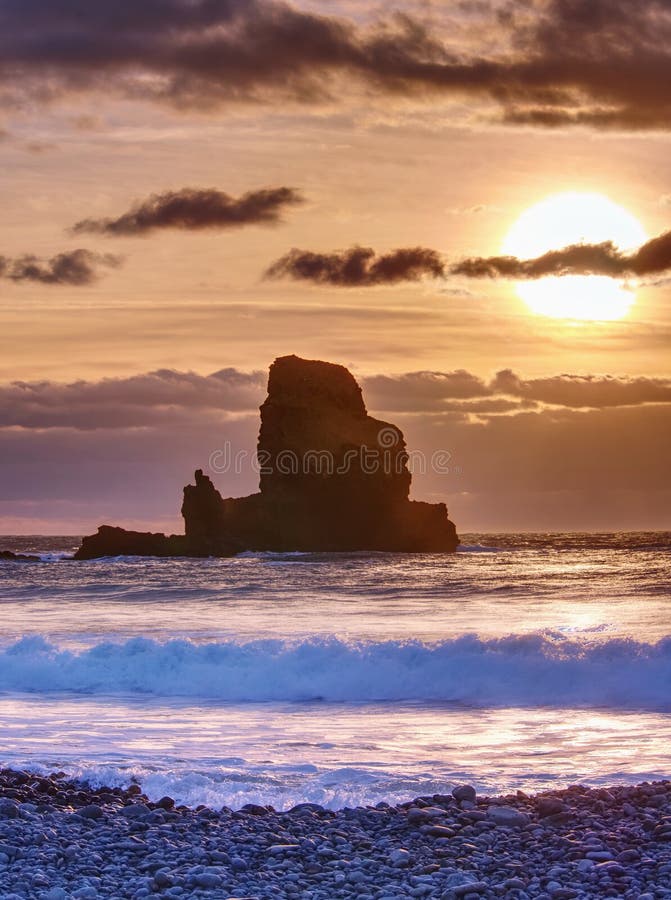 Sea Stack Silhouette by Sunset Sky. Evening Light on the Rocks, Stock ...
