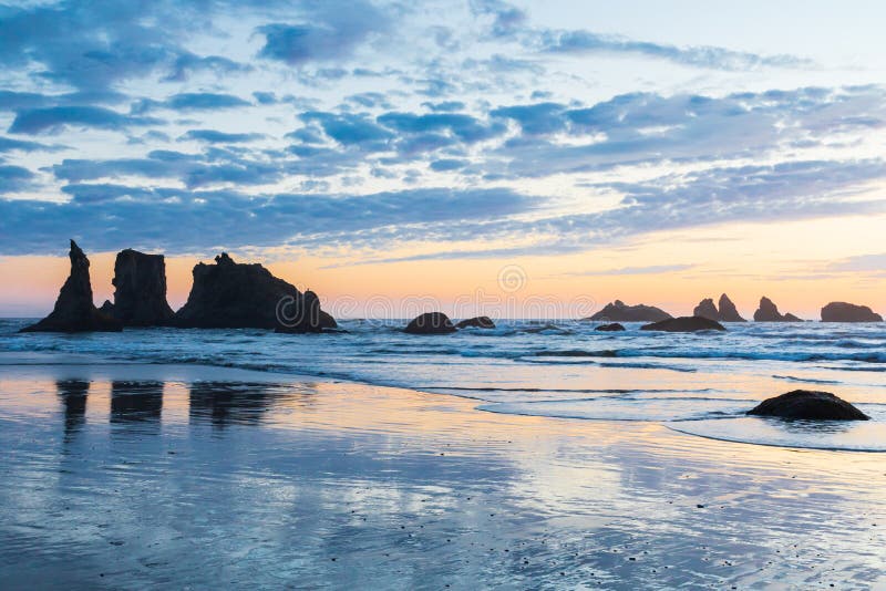 Sea Stacks on the Oregon Coast at Sunset Stock Image - Image of sand ...