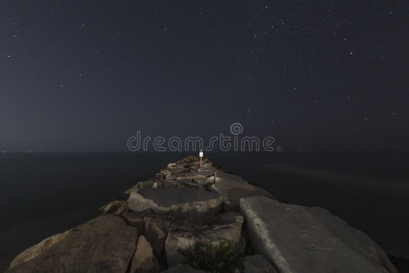 Sea with Starry Night Sky Seen from the Cliff Stock Image - Image of ...