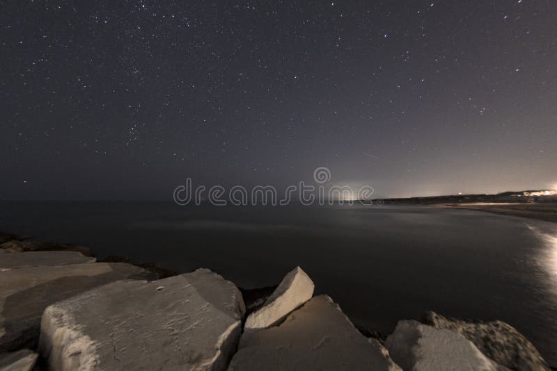 Sea with Starry Night Sky Seen from the Cliff Stock Photo - Image of ...
