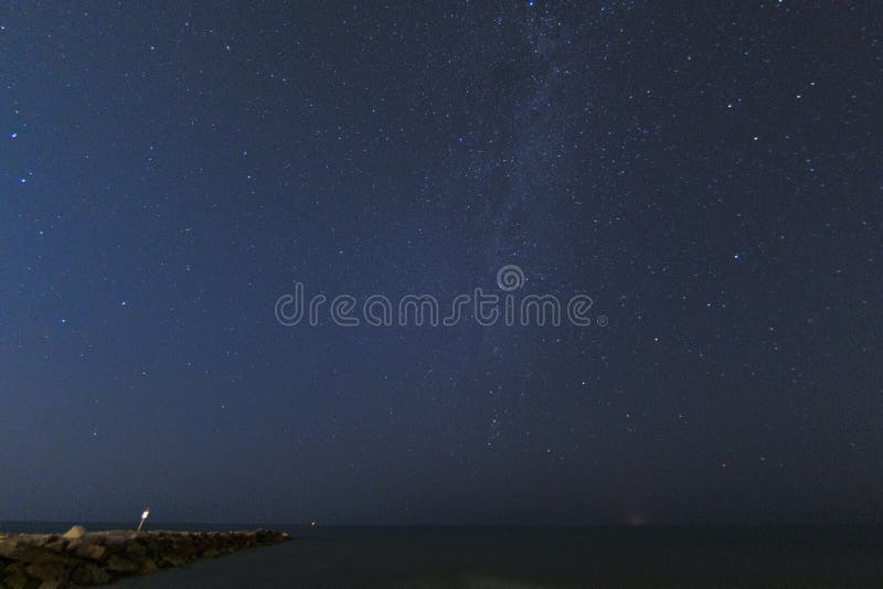 Sea with Starry Night Sky Seen from the Cliff Stock Image - Image of ...