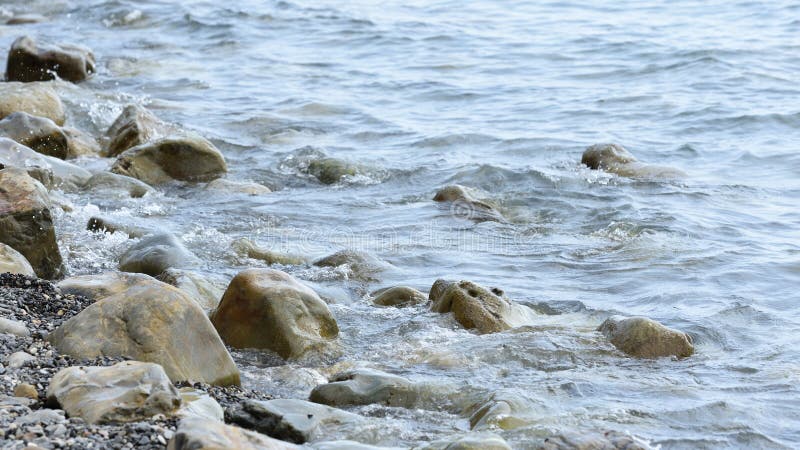 Sea Stone Beach with Large Stones and Small Waves Stock Photo - Image ...
