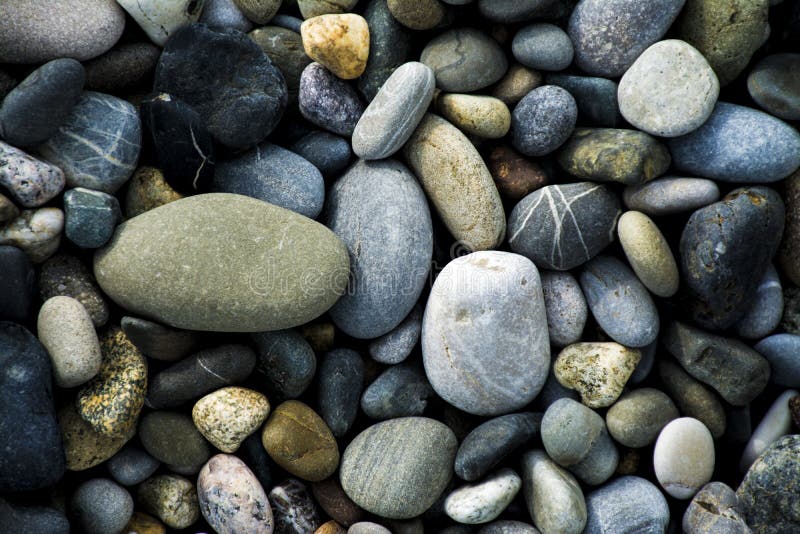 Sea stones stock image. Image of black, round, surface - 127686153