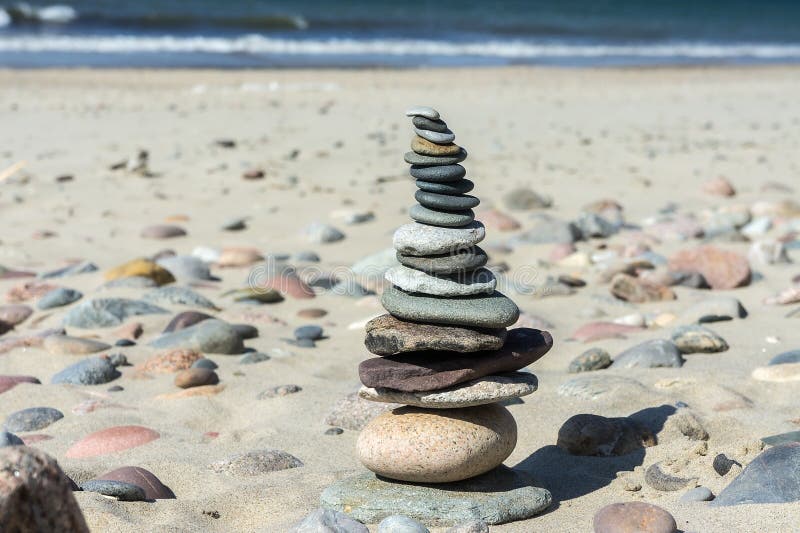 Sea Stones Stacked One on Top of Another, a Pyramid of Flat Stones ...