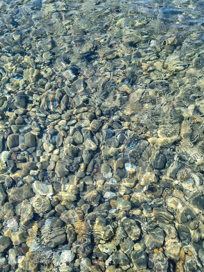Sea Stones Under Water with Ripples in Greece Stock Image - Image of ...