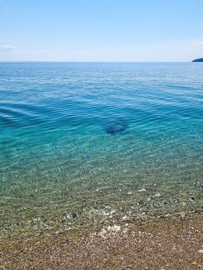 Sea Stones Under Water with Ripples in Greece Stock Image - Image of ...