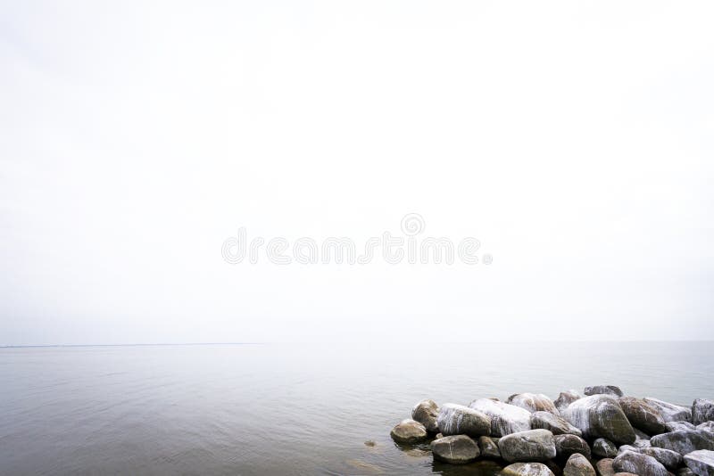 Sea with stones stock photo. Image of pebble, idyllic - 175519820