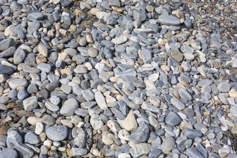 Sea Stones or the Wet Smooth Black Stone on the Beach As Background ...