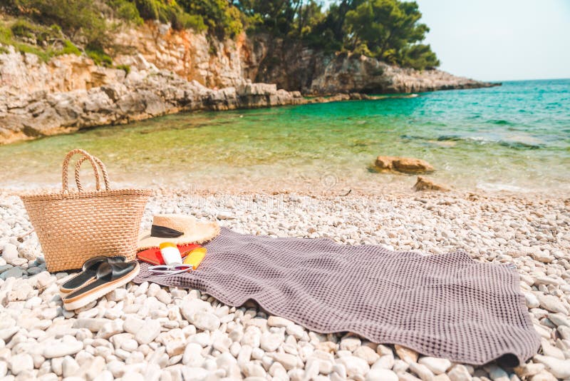 Sea Stuff at Blanket at Rocky Beach Stock Photo - Image of summer, book ...