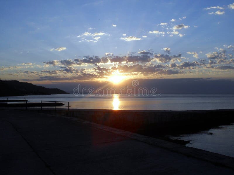 Sea Sunrise Over Alushta: Sun Rays and Horizon Stock Image - Image of ...