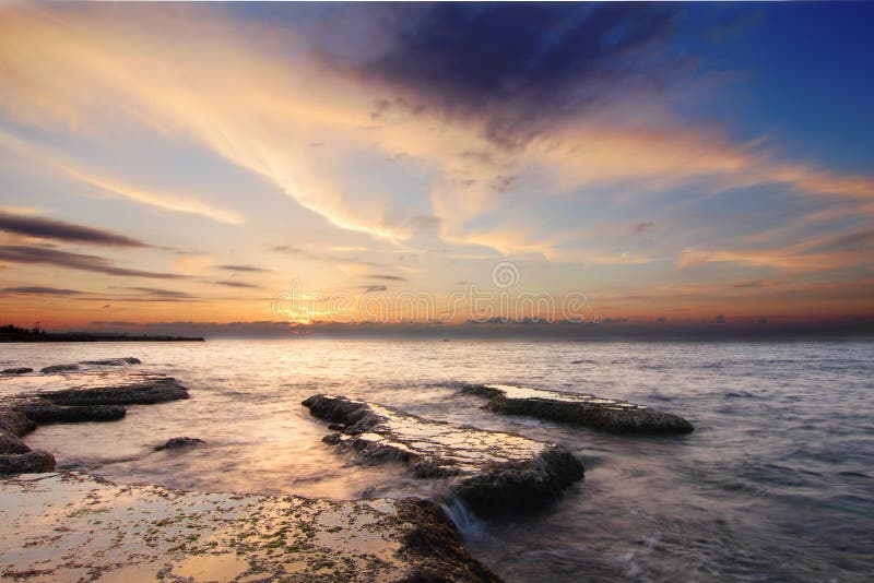 Sunrise over sea stock photo. Image of beach, rocks, marine - 19512204